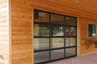 中国 手動または自動開口のガラスガレージドアの現代的なダブルガラスのアルミニウムセクションドアは,ディーラーのための安い 販売のため