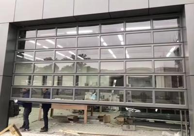 中国 安全 アルミ セクション ドア 多彩のダブルガラスのガラス 完全視上 オーバーヘッド セクション アルミ合金 販売のため