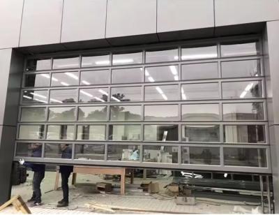 中国 モダンアルミ断面ドア 多彩のダブルグラスガラス 9x8 9x7 16x7 モダンオーバーヘッド フルビュー 販売のため