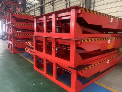 Chine Nivelateur de quai de chargement personnalisable avec chaînes de sécurité / Source d'alimentation électrique 6T / 10T Capacité entrepôt de tonnes hydrauliques à vendre