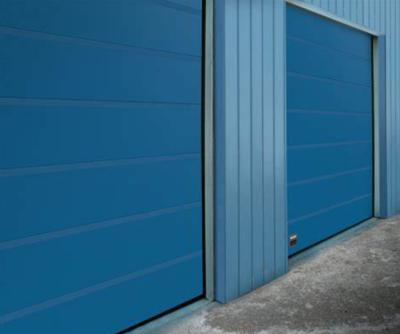 China Fire Station Industrial Sectional Doors In White Colour And Automatic Formed Design Factory Direct Sale for sale
