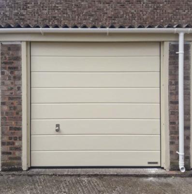 China Fire Station Industrial Sectional Doors In White Colour And Automatic Formed Design Factory Direct Sale for sale