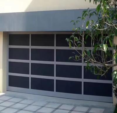 中国 エレガントのアルミ断面ガレージドア 強化されたセキュリティとノイズ削減 風力防止ハード倉庫 急速ロール 販売のため