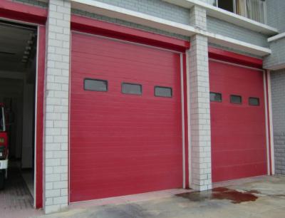 중국 Gray Steel Insulated Sectional Commercial Garage Doors Industrial Vertical Lift Door 판매용