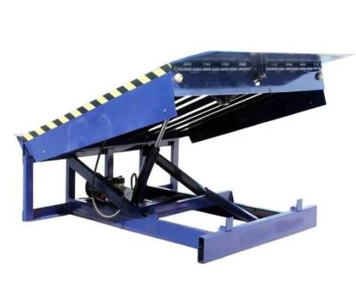 China Aanpasbare dekhoogte Elektrische dokdeur levelers Workshop Automatische dokplaat 25000-40000LBS Veilig ontwerp Zwaar werk Te koop