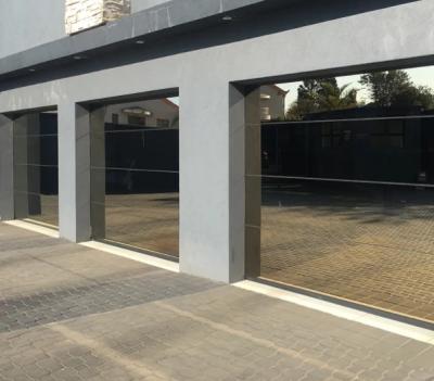 中国 オーダーメイド 商用 双窓ガラス 断面ガレージ ドア 防水性 3 級 手動または自動 販売のため