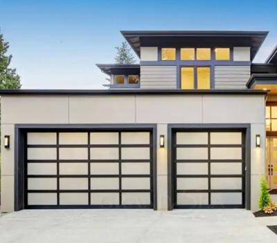 China Custom Insulated Panel Garage Door Patio Water Tightness Class 3 Transparent Glass Sectional Door Modern Design With Double Glazing for sale