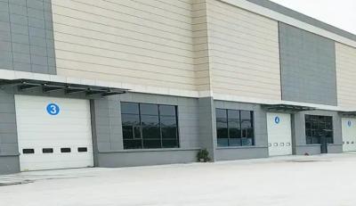 Large Industrial Workshop Sectional Overhead Door Flat Or Contoured Panel Design 50mm-80mm Thickness Insulated Sectional Garage Door