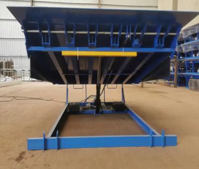 China Taller de niveladores de puertas de muelle placa de muelle automática 25000-40000LBS diseño seguro mecánico de alto rendimiento eléctrico hidráulico carga flexible en venta