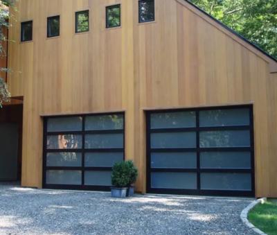 China Modern Durable Customized Size Automatic Powder Coating Sectional Garage Door with Aluminum Alloy and Transparent Glass for sale