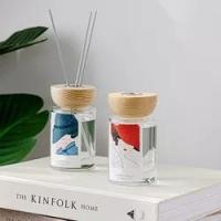 China Private Label Glass Bottle Reed Diffuser Sets With Wooden Cap for sale