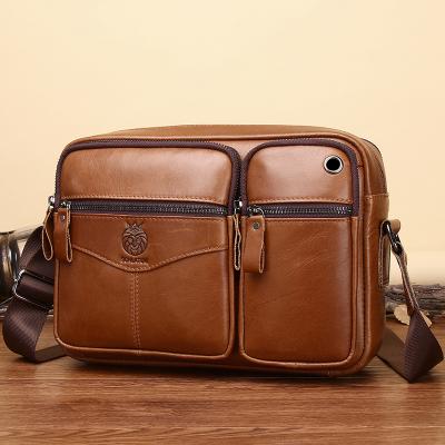 China SCHLATUM 2022 Fashion Waterproof Custom Design Rectangle Retro Earphone Men Genuine Leather Single Shoulder Bags factory