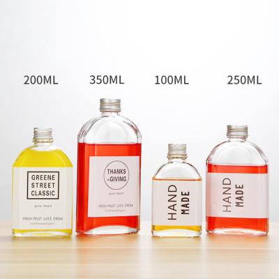 China Flint Glass Bottle with Lid,200ml glass bottle for iced coffee for sale