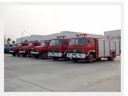 10-Axle Low-Flatbed Semi-Trailer Transporting Heavy Machinery Can Be Retrofitted with Container Turn Locks.