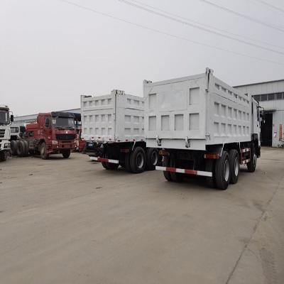 China 12 rodas usadas 420 HP 375 HP camião de descarga pesado com cadeira de motorista de suspensão pneumática à venda