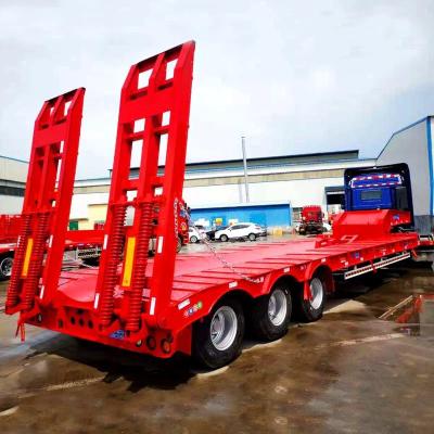 Cina Semi-remolchi a terra piatta da 100 tonnellate a tre assi e quattro assi per il trasporto di attrezzature pesanti in vendita