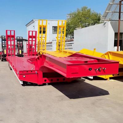 Cina Semi-remolchi a terra piatta da 100 tonnellate a tre assi e quattro assi per il trasporto di attrezzature pesanti in vendita