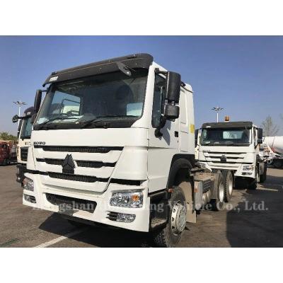 中国 良い状態のHOWO トラクタートラック 6X4 371/375HP 99% 手動窓付き重用トラック 販売のため