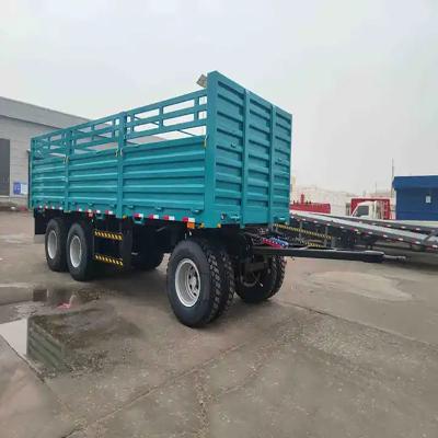 中国 フラットベッド3軸型U型傾斜式半トレーラー 2速着陸脚付きダンプトレーラー 販売のため