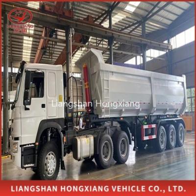 Cina 50-100 tonnellate Camion di scarico carico pesante laterale ribaltatore miniere Camion di scarico semi-remolchio 12r22.5 pneumatico in vendita