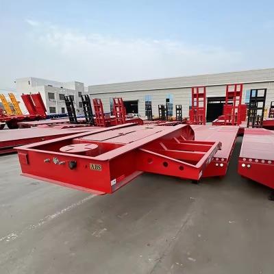 Cina Camion di tipo furgone da 60-100 tonnellate semirimorchio a letto piatto con tre assi idraulici retrattili in vendita