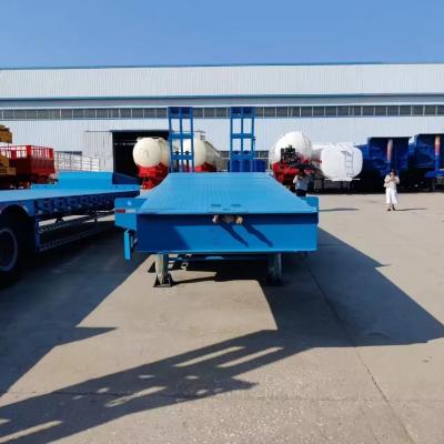 中国 グースネック掘削機 輸送用 28t の着陸脚を搭載した平床コンテナの半トレーラー 販売のため