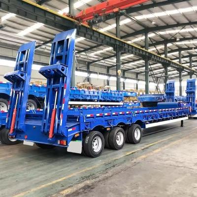中国 120tの荷重容量と自転ダンピング機能を持つ自転ダンピング低床トレーラー 販売のため