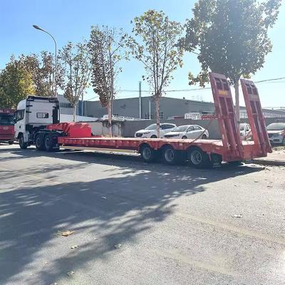 China Low-Bed Truck Trailer Lowboy Flatbed Truck Iron Tread 1820mm Heavy Duty 3 Axles 100t Te koop