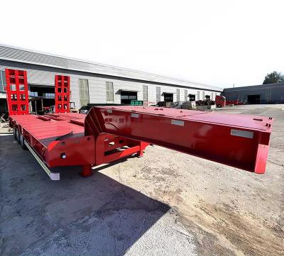 China Chinese 3 en 4 assen lage platbed zware vrachtwagens met klantvereisten Te koop