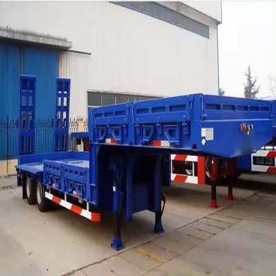China 13500X3000X1550 mm Meest populaire 11 as 40 ton laag bed half-trailer op maat Te koop
