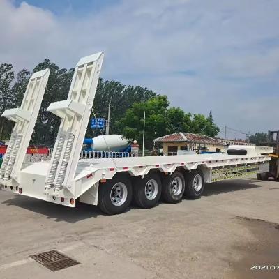 China Aanpasbaar dubbele tri-as 40FT platbed chassis Halve aanhanger met platbed ontwerp Te koop