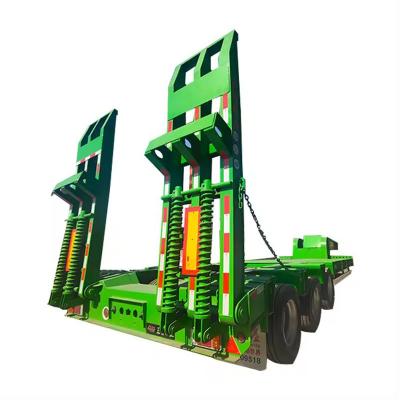 China Zware 50 ton maximale lading 3 assen laagbed semi-truck aanhangwagen stalen standaard 28 ton Te koop