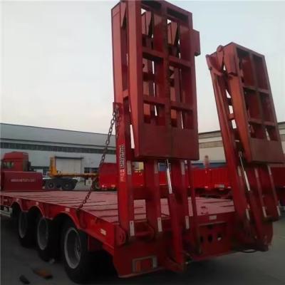 China 13500X3000X1550 mm ijzeren half-aanhanger met laag bed voor het transport van machines 13m platbed aanhanger Te koop