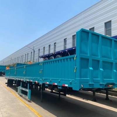 China 5.5 Tons 3-Axis Sidewall Multi-Function Dump Semi-Trailer for Heavy-Duty Applications for sale