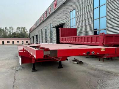 Cina Camion con contenitore a tre assi semirimorchiato basso piatto a tre assi 40 piedi semirimorchiato in vendita