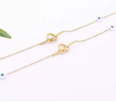 Cina Collane lunghe di moda in acciaio inossidabile Collane d'oro impilate con bulbo oculare blu in vendita