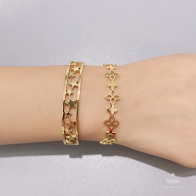 Cina Bracciale regolabile in acciaio inossidabile 304 316 316L con fiore in oro cavo stile anello in vendita