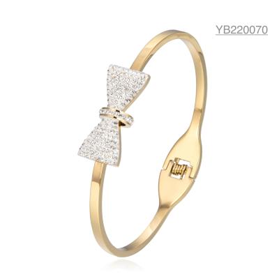 China Brazalete con lazo de diamantes de imitación de primera calidad, pulseras con botón a presión de acero inoxidable y oro de 14 quilates en venta