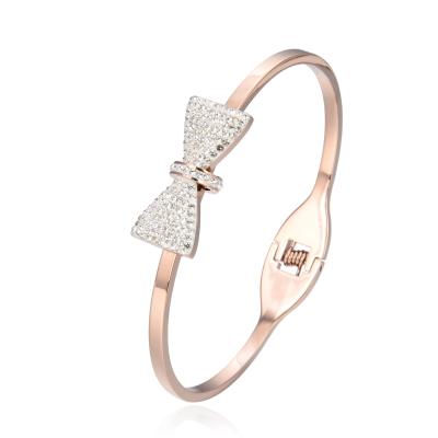 Cina Braccialetti con bottone a pressione in acciaio inossidabile oro 14k con fiocco in strass di alta qualità in vendita