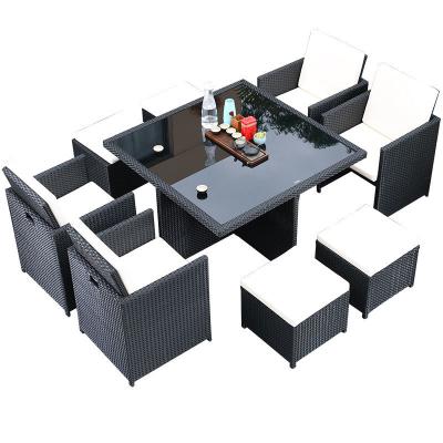 China 8 Seater Outdoor Rattan Chairs Courtyard Garden Space Saving Tempered Glass Coffee Table Set for sale