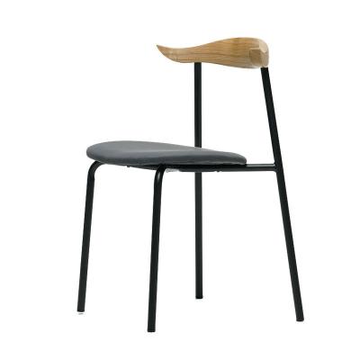 China Nordic Design Solid Wood Cow Horn Chairs Dining Room Leatherette Metal Modern Side Chair for sale