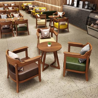China Hot Sale Commercial Restaurant Furniture Elegant Design Coffee Shop Tables and Chairs Set with Ergonomic Seat Cushion for sale