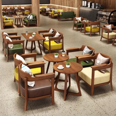 China Modern Nordic restaurant furniture set with solid wood frame, high-density rebound sponge cushion, and ergonomic backrest design for sale