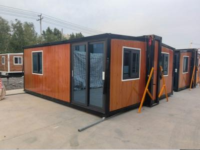 China Waterproof Prefab Container House with Polygon Roof and Tempered Glass Roof Material for sale