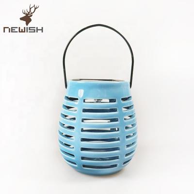China 10.5*12c mcamping table light  blue ceramics lantern  with 1L warm white led with solar panel light garden for home disco lights for sale