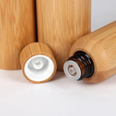 中国 15ml 30ml 50ml Empty  Bamboo Cosmetic Essential Oil Glass Bottle Screaw Cap 販売のため