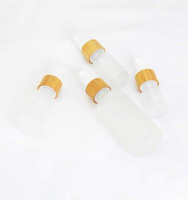China 30ml Frosted Glass Lotion Bottle Travel Pump Bottles cosmetic glass bottle for sale