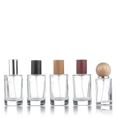 China 30ml Glass Perfume Spray Bottle Liquid Sprayer Travel Refillable Bottle Wood Lid for sale