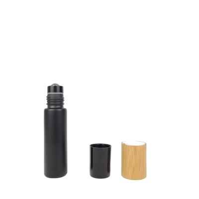 China 10ml 22/400 Essential Oil Bottles Bamboo Cap 22mm Clear Glass Roller Bottles for sale