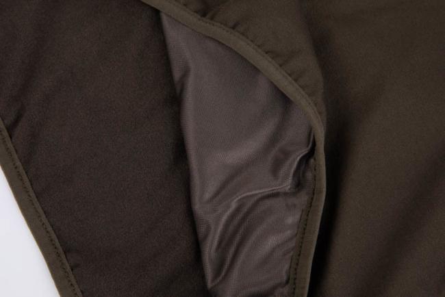 Layering demonstration showing jacket worn as mid layer under shell jacket